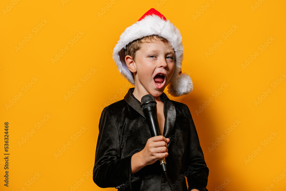 Boy singing loud Christmas song Stock Photo | Adobe Stock