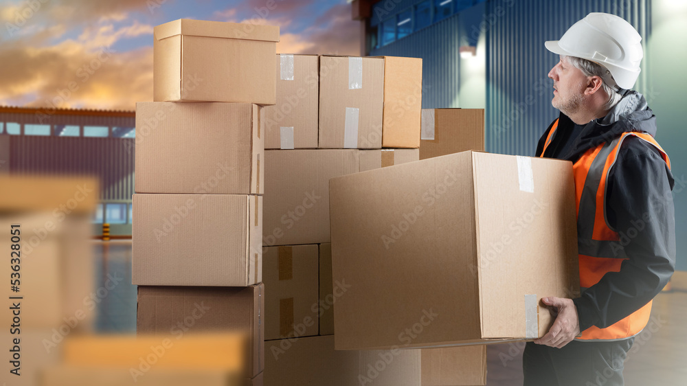 Man loader. Human with big box in his hands. Guy works as loader in ...