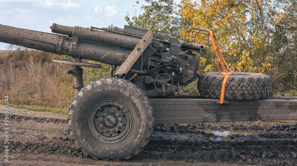 War in Ukraine, captured Russian 150 mm howitzer, side view. Kharkov ...
