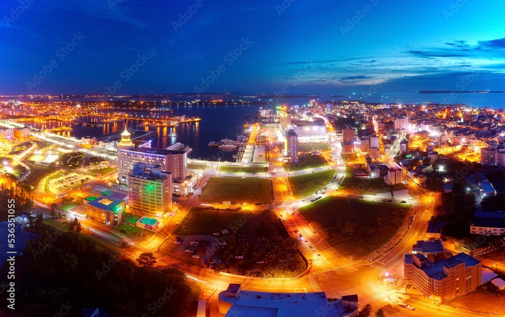 Aerial view of Magong seaport at sunset, the capital city of Penghu ...