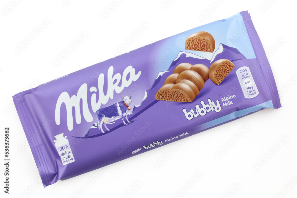 Milka bubbly alpine milk chocolate packaging isolated on white ... Milka bubbly alpine milk chocolate packaging isolated on white ...