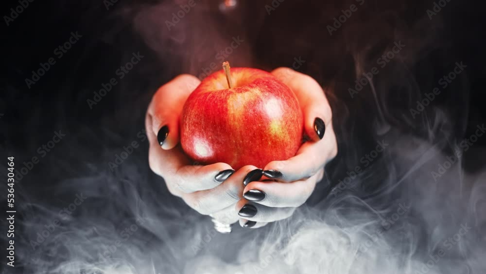 Woman as witch offers red apple - symbol of toxic proposal, lure ...