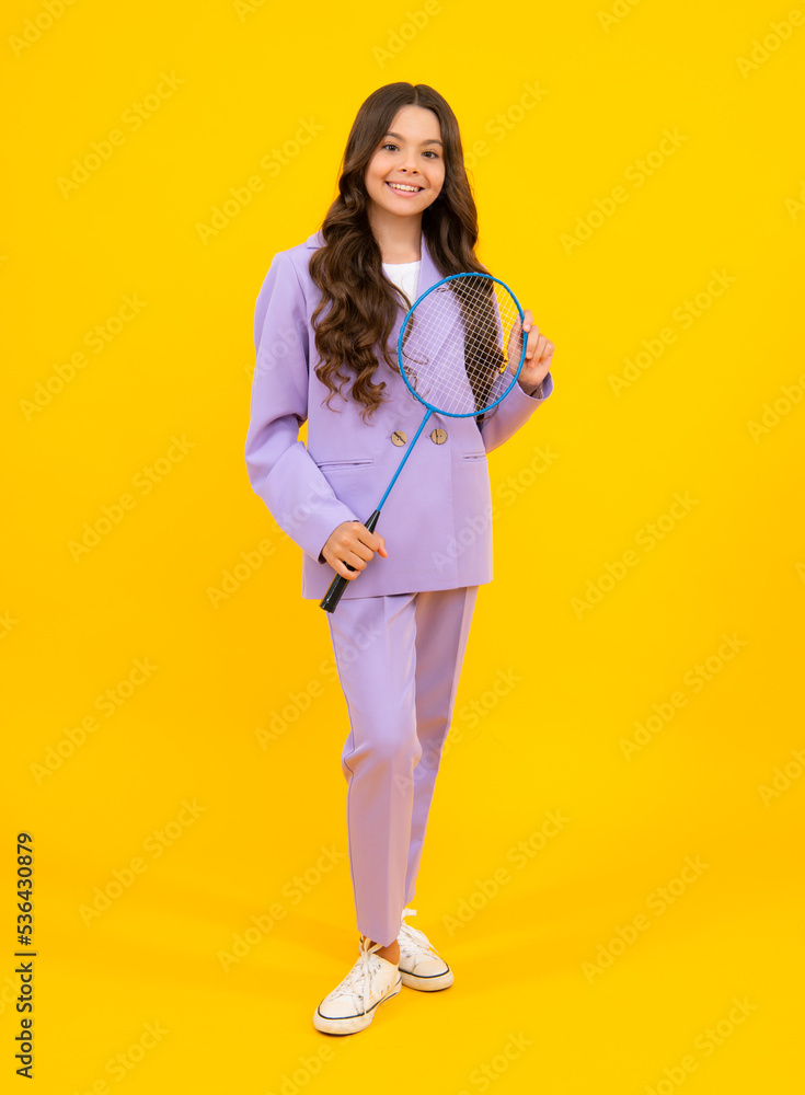 Teen Girl Badminton Player With Badminton Racket Isolated On Yellow