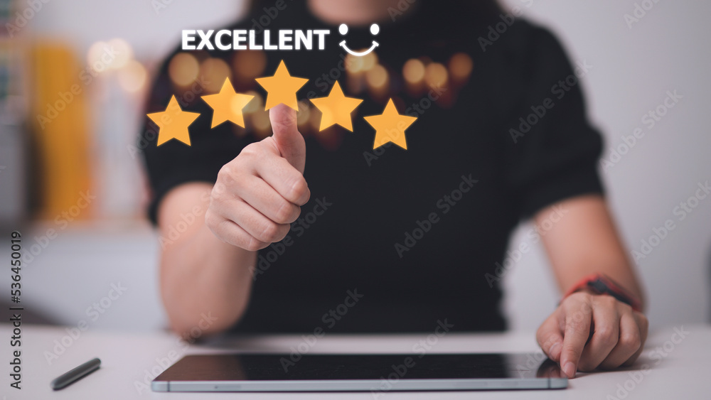 customer hand with gold five star rating feedback icon and press level ...