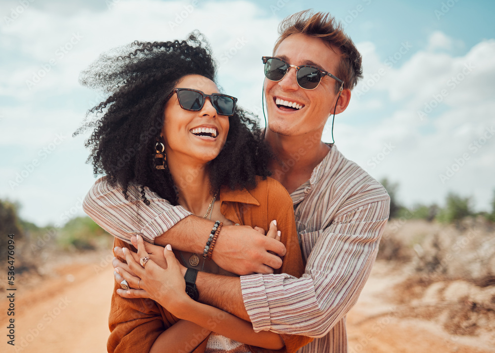 Couple, happy and smile hug in nature on a travel, adventure and road ...