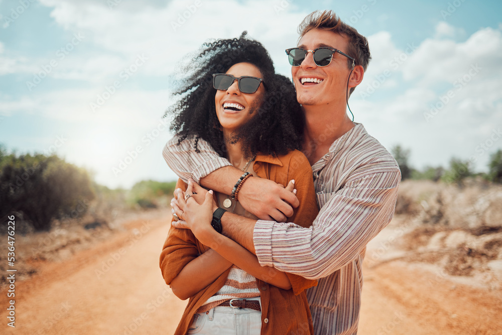 Happy couple, hug and love, smile and travel on roadtrip to the outback ...