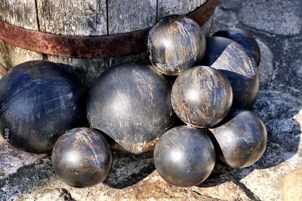 Pyramid of cannon balls on a ship. Designed to fire a heavy projectile ...