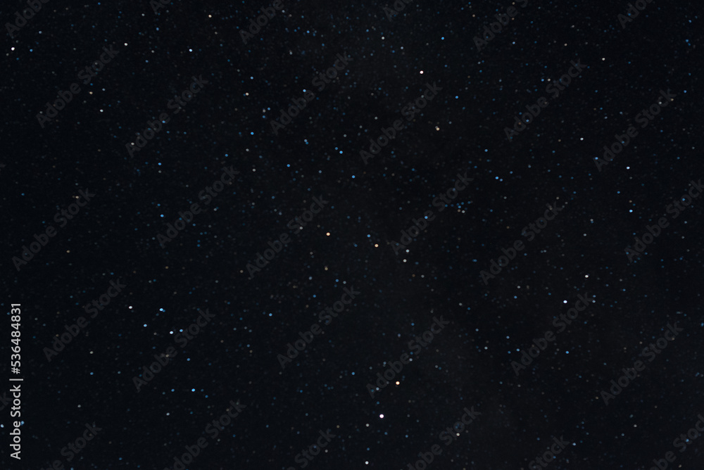 Many stars on black sky at night. A real dark night sky with plenty of ...