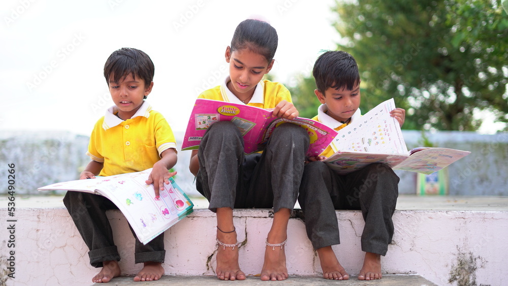 Cute indian little child studying at home. Indian kid studying Stock ...