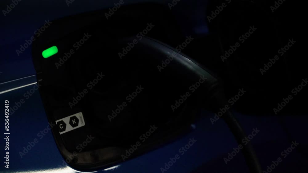Light effect on electric car charging cable 2 Stock Video | Adobe Stock