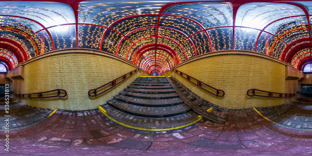 spherical night 360 panorama in festively lit underground passage ...