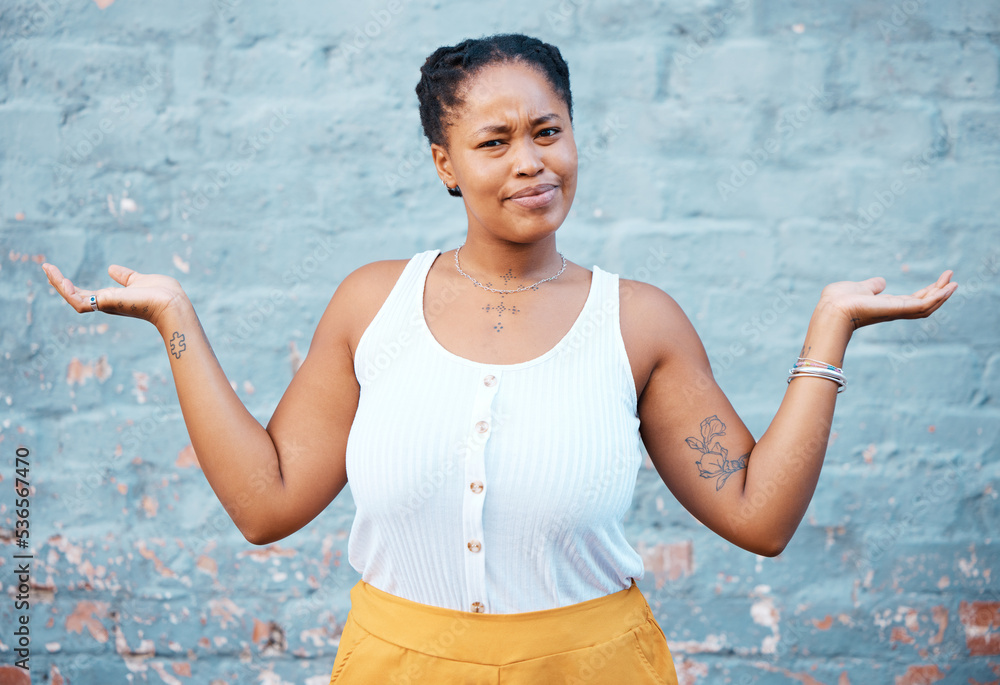 Portrait of confused black woman in doubt with a question and unsure ...