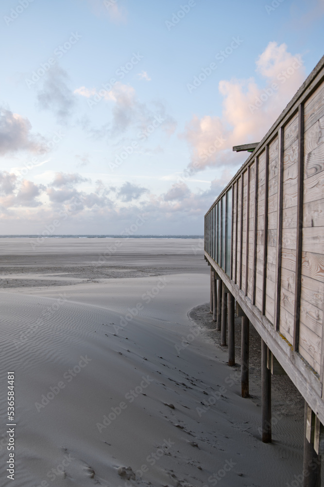 Wooden construction standing on the beach in Texel Island, Netherlands ...