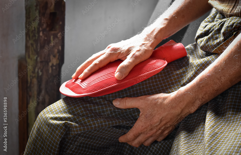 Thigh pain in Asian male patient. Concept of muscle sprain, sciatica or ...