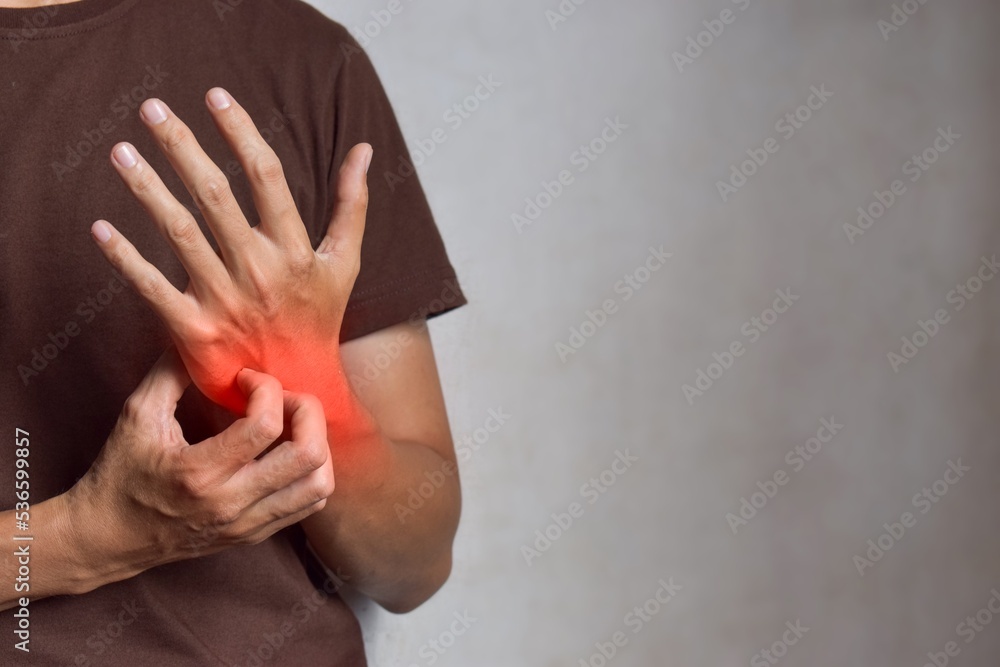 Asian man scratching his hand. Concept of itchy skin diseases such as ...