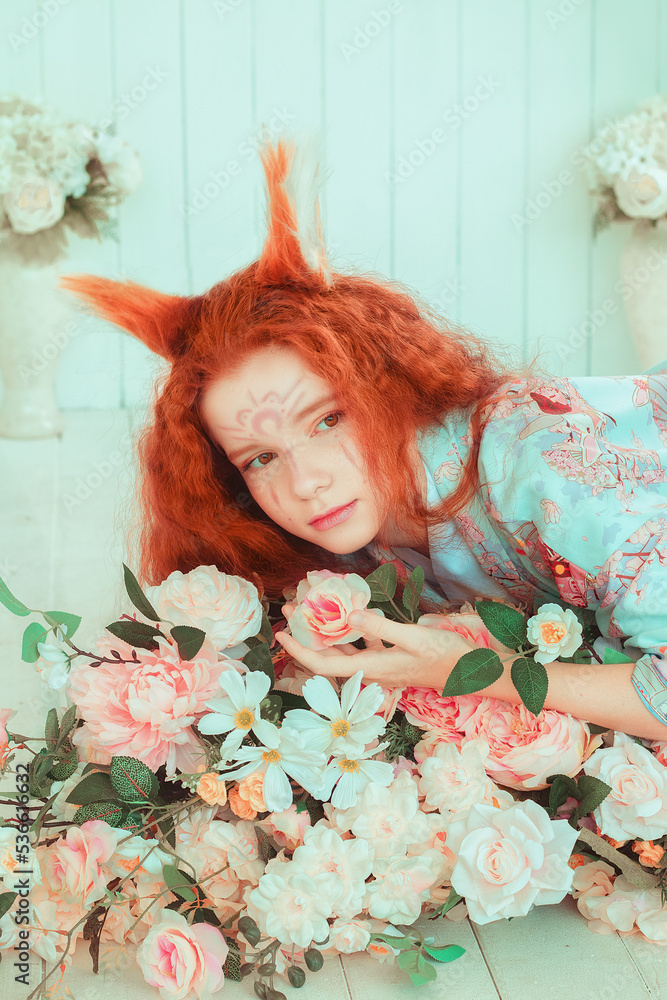 young red-haired girl with fox ears and tails. Nine tailed fox Stock ...