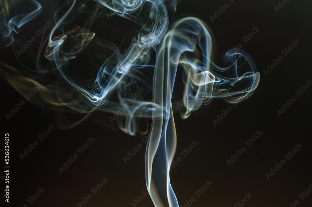 Trajectory of incense smoke in the air showing different shapes. Stock ...