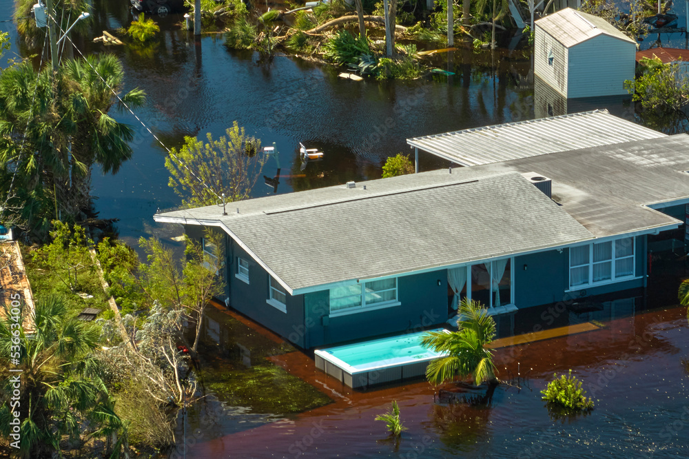 Flooded house by hurricane Ian rainfall in Florida residential area ...