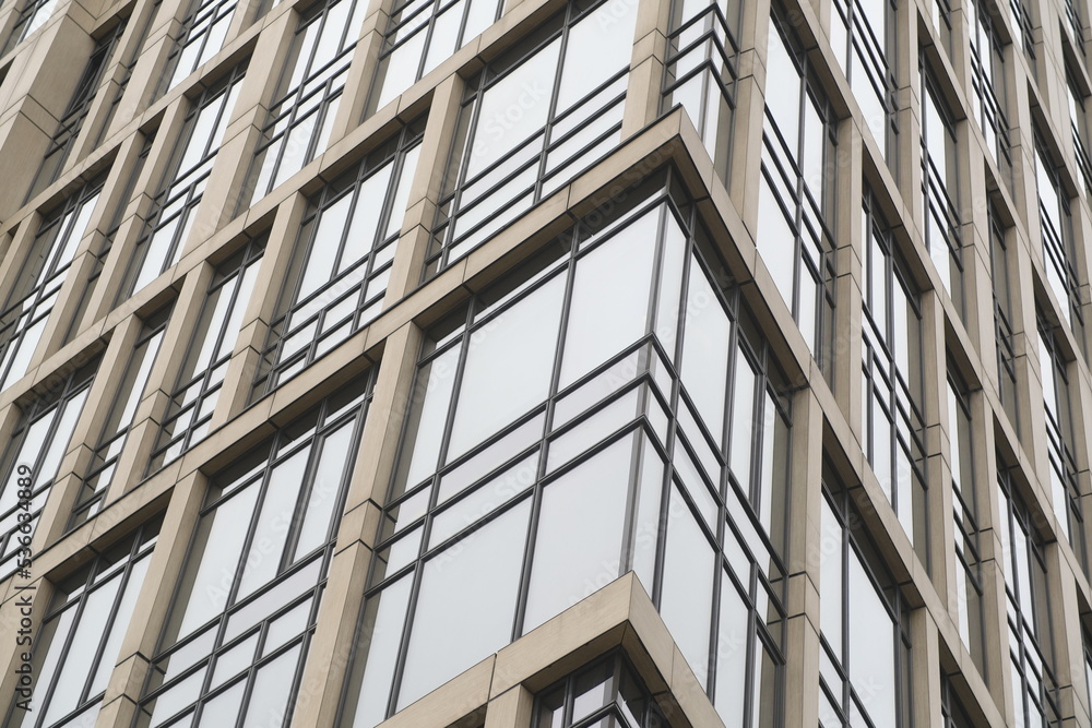 Facade of modern high-rise building with glass windows. Texture of ...