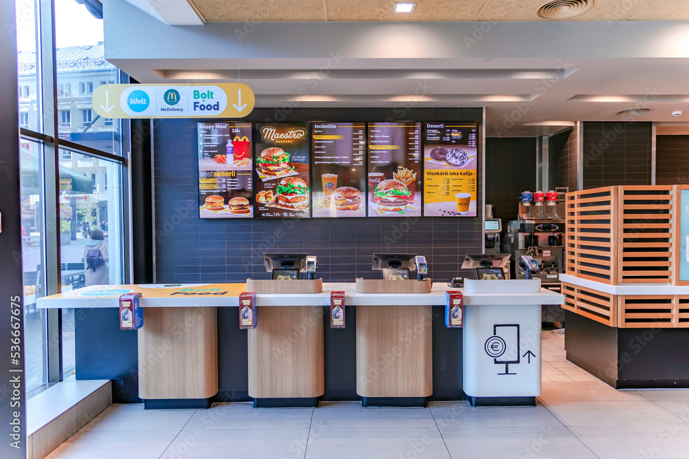 LATVIA, RIGA, SEPTEMBER, 2022 - McDonalds counter with menu of ...