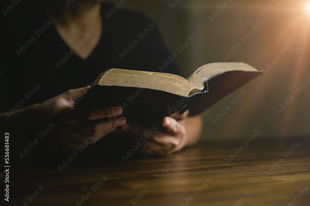 Prayer person hand in black background. Christian catholic woman are ...