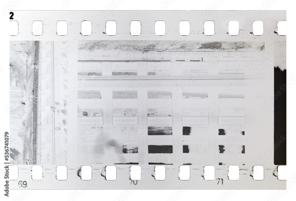 Strip of old, used and bad developed celluloid film on transparent ...