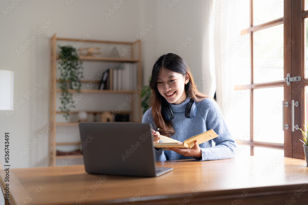 Smiling girl student wear headphone study online with teacher, happy ...