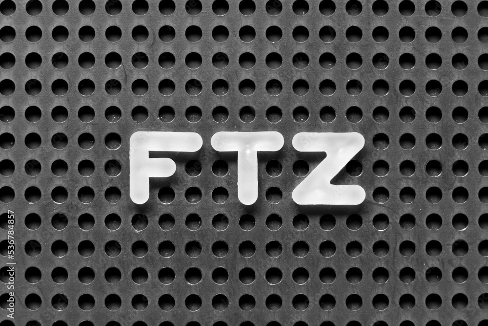 White alphabet letter in word FTZ (Abbreviation of Free trade zone) on ...