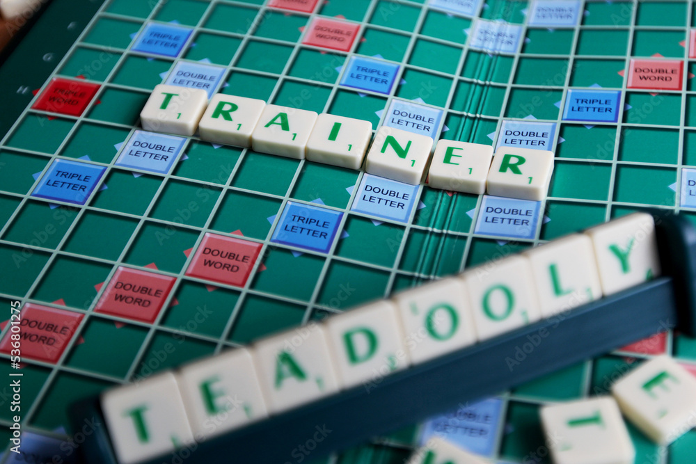 word made by letter pieces, with word TRAINER. Conceptual images. Stock ...