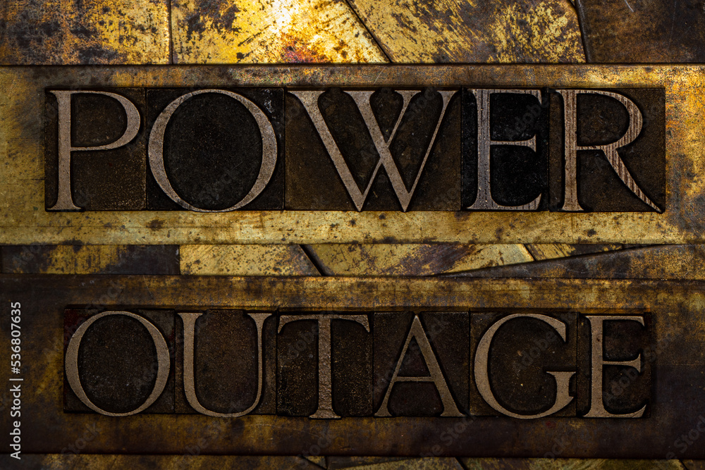Power Outage text on grunge textured copper and gold background Stock ...