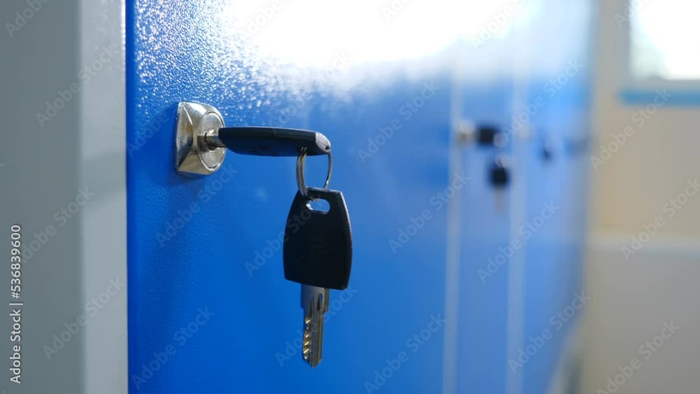 Inserted keys in iron locker doors in gym dressing room. Locker room ...