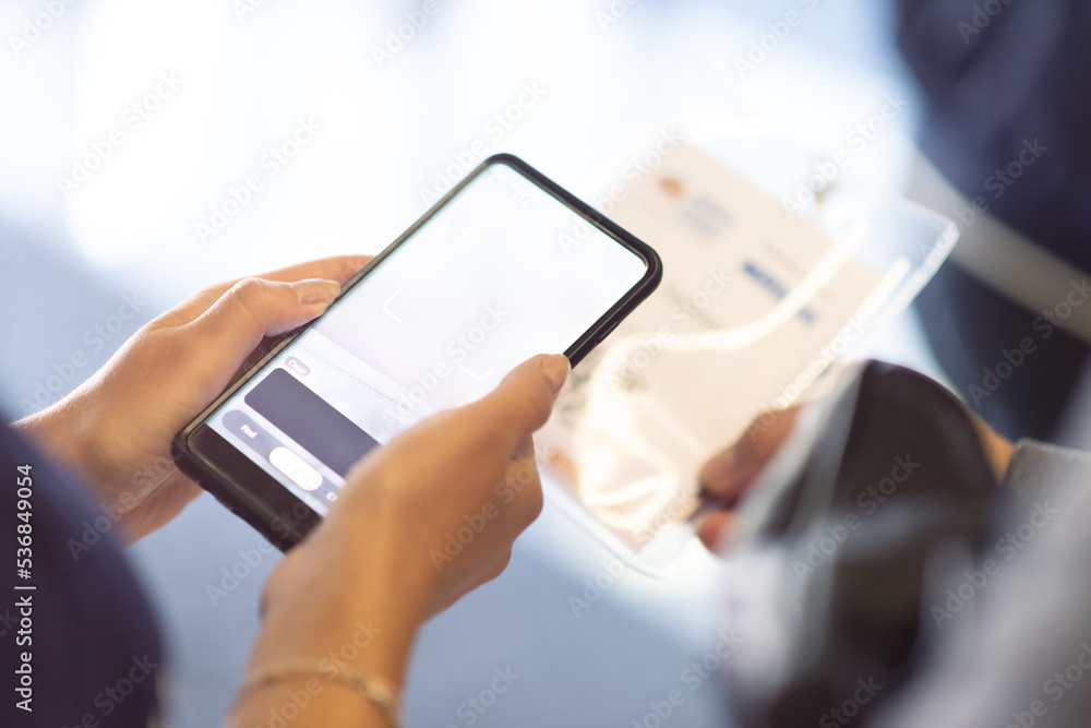 Conference Staff Member scan a QR code from attendee upon arrival to ...