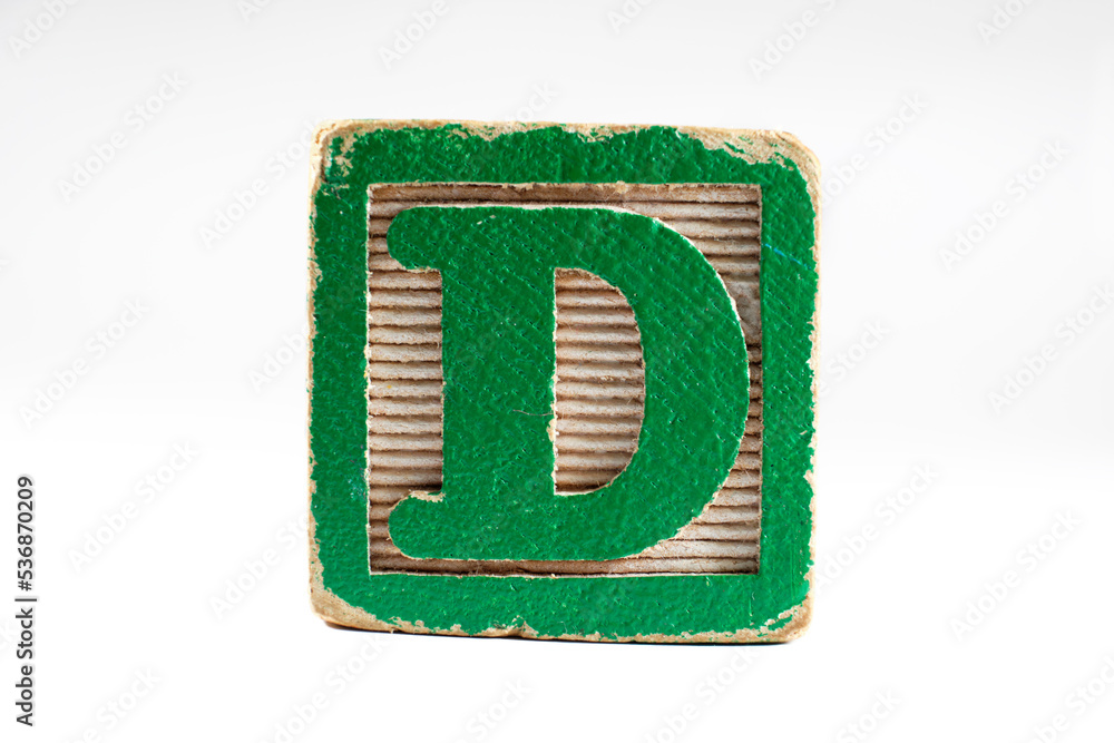 Retro vintage green and white toy block of the letter D. The block ...