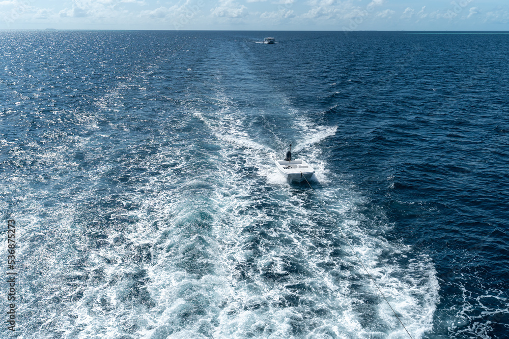 View from the boat stern of the wake (wash) effect on the water from ...