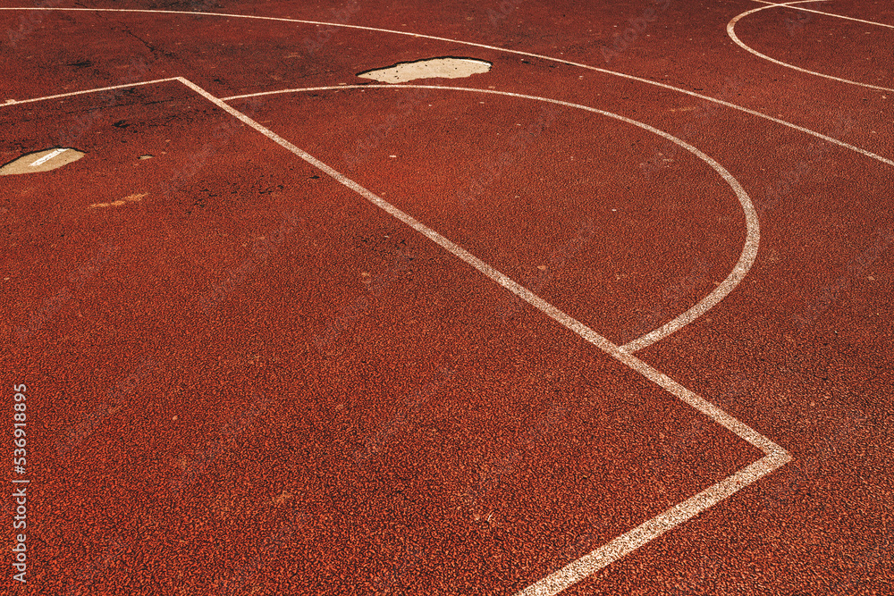 Worn damaged outdoor basketball court surface Stock Photo | Adobe Stock