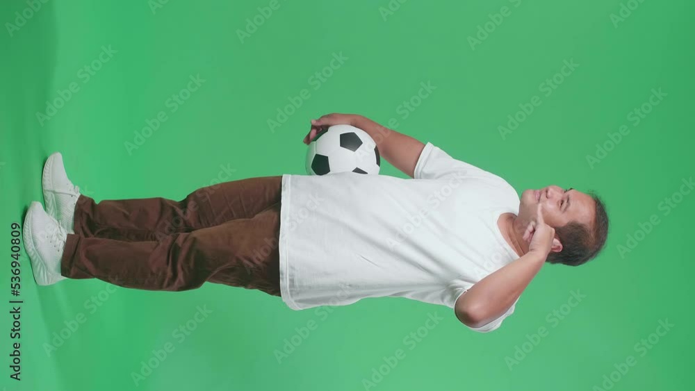 Full Body Of Asian Man With A Ball Making Fun Of The Losers By Ooh Face ...