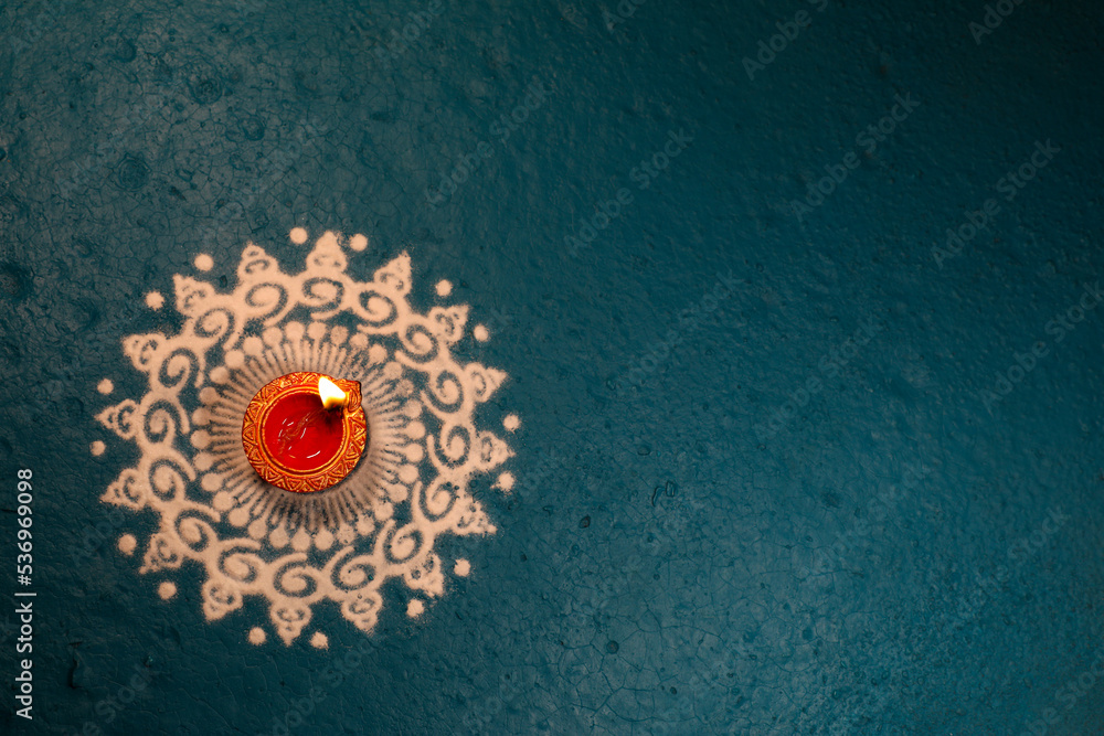 Happy Diwali Festival of Lights teal color background with red and ...