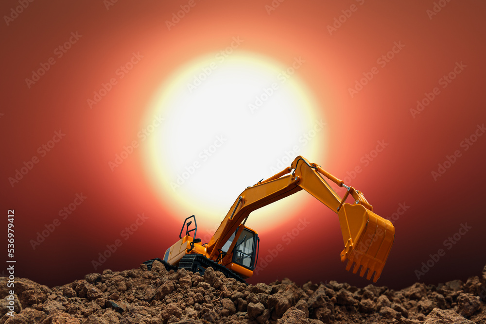 Crawler excavators are digging the soil in the construction site on the ...