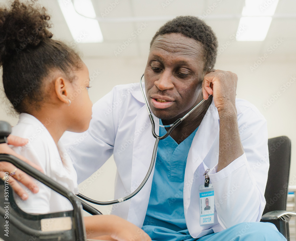Male doctor checkup little child patient heartbeat with stethoscope for ...