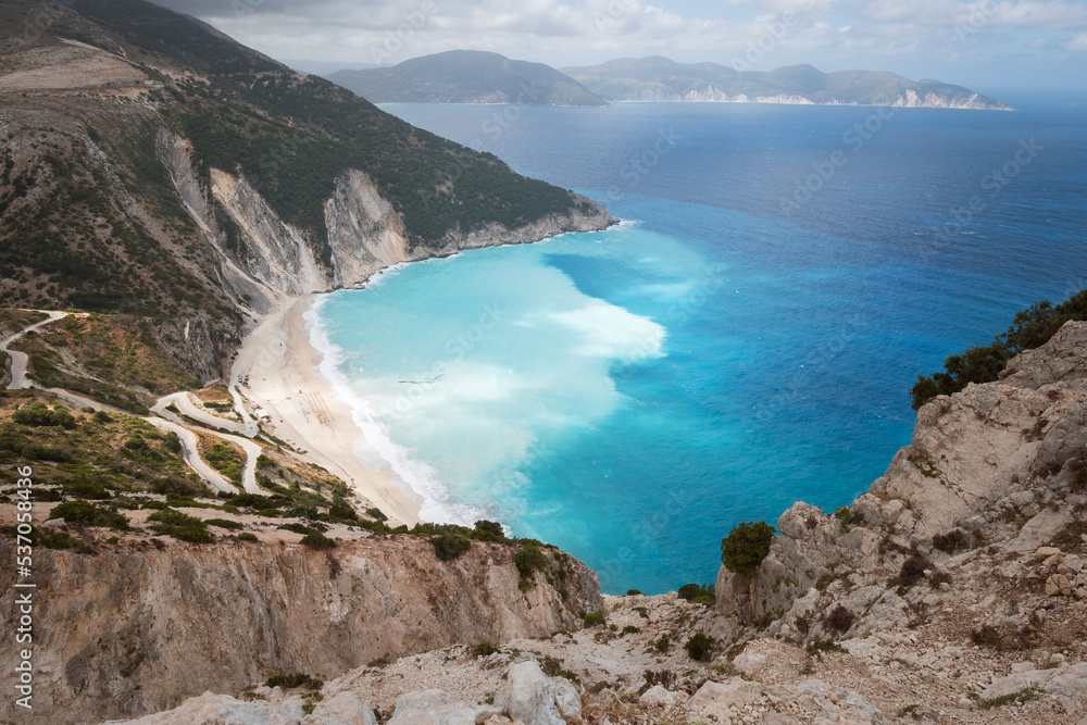Myrtos Beach - unique turquoise water landmark seashore with a bright ...