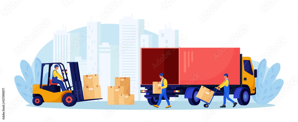 Warehouse workers loading, stacking goods with electric lifters in ...