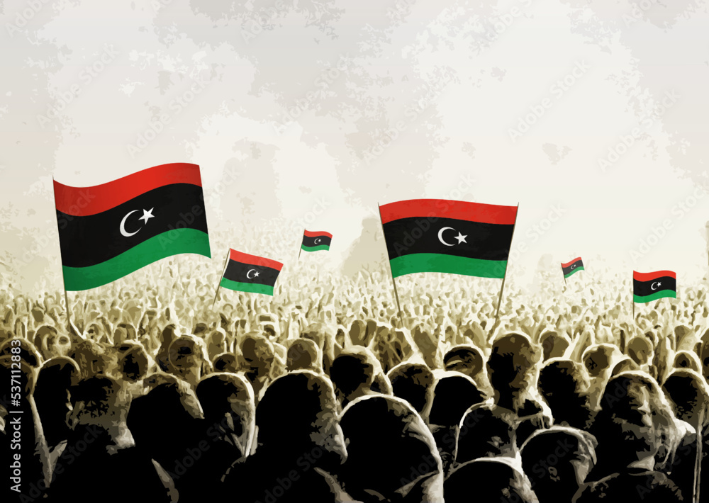 Crowd with the flags of Libya, people cheering national team of Libya ...