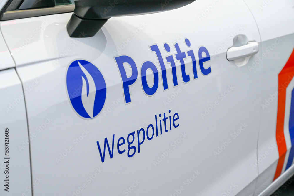 Police car in Belgium. Emblem and name of Belgian police. Side view of ...