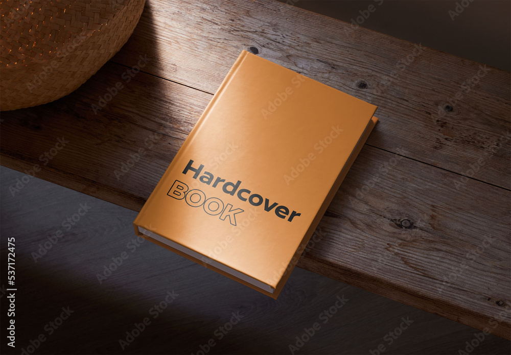 Hardcover Book Mockup on Wood Table With Natural Light and Shadows ...
