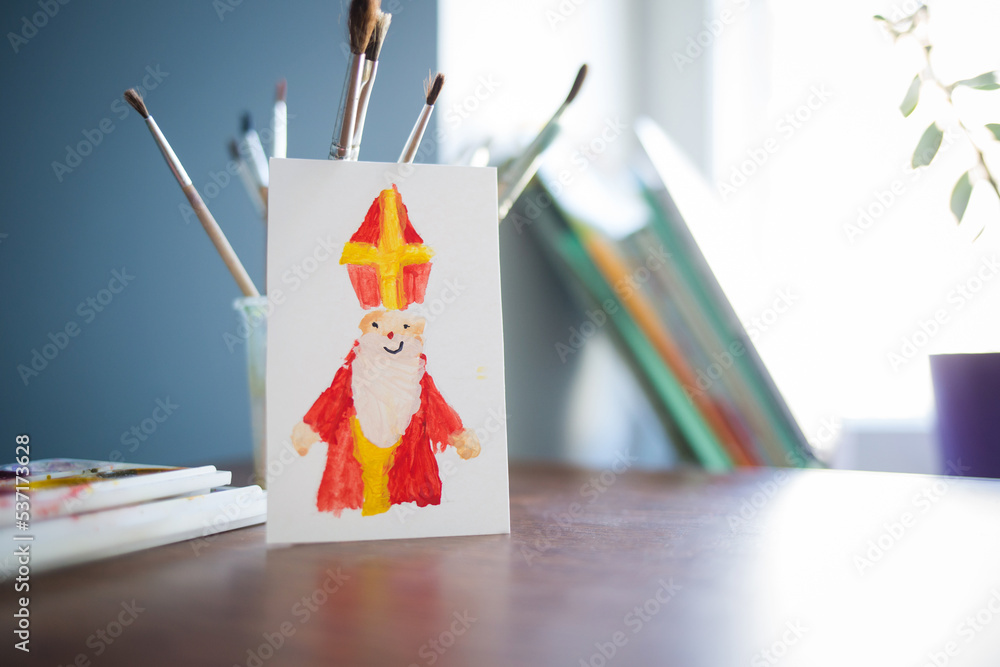 children's drawing - card for day of saint nicholas on table background ...