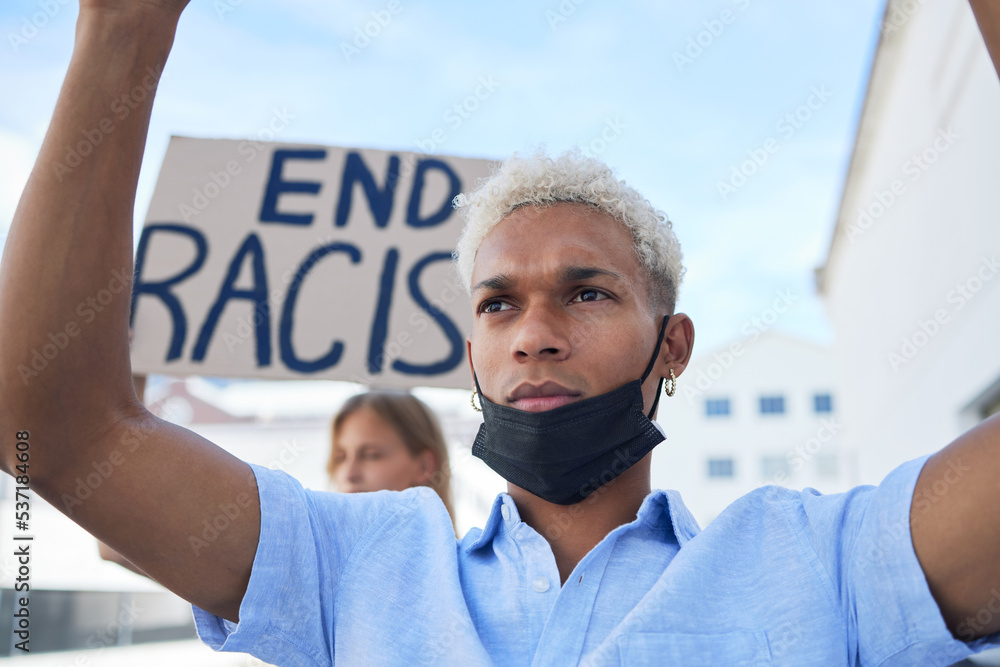End racism sign, poster and black man protest in face mask, cardboard ...