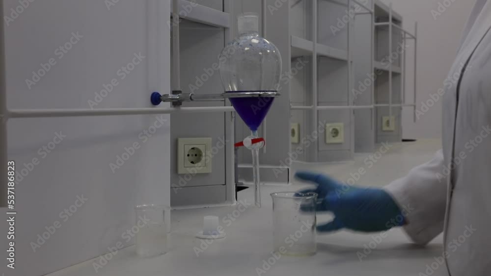 Separating funnel laboratory glassware used in liquid-liquid ...