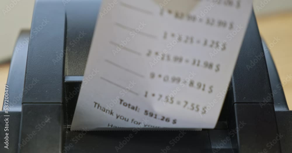 Supermarket unrecognizable paper receipt from cash register close up ...