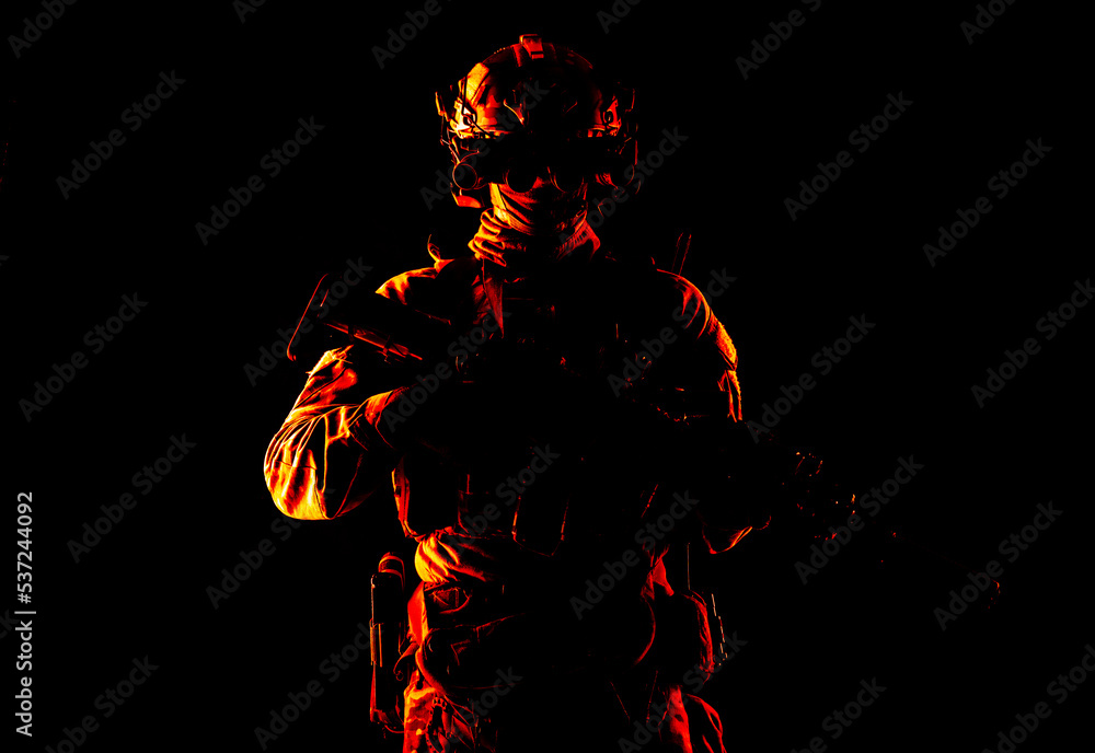 Half length, low key studio shoot of army soldier, marine infantryman ...