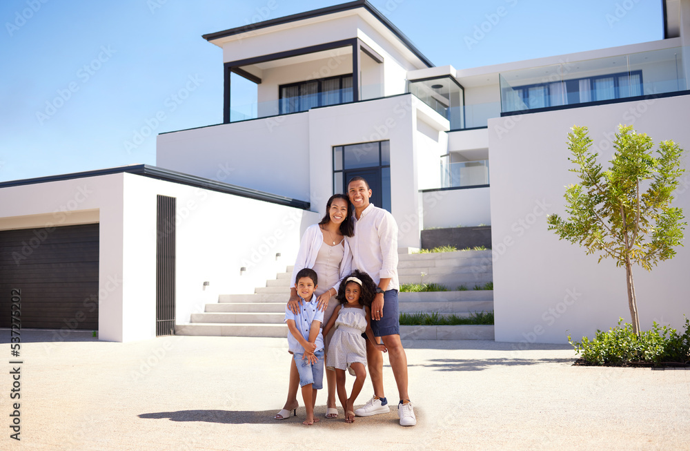 Portrait, real estate and happy family moving into their new luxury ...